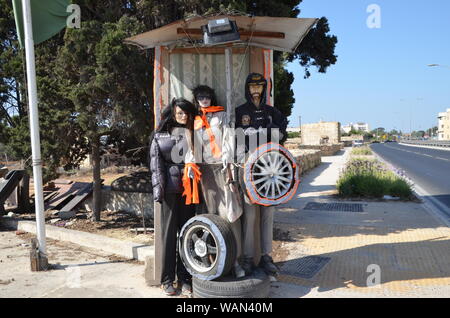 bizarre spooky mannequins at roadside tyre repair service in malta ...