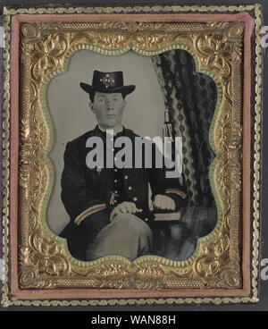 Corporal John I. Guigher of Co. I, 56th Pennsylvania Infantry Regiment in uniform with book ...