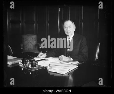 Daniel C. Roper at desk Stock Photo - Alamy