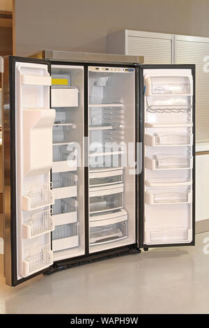 Open double fridge in modern kitchen Stock Photo - Alamy