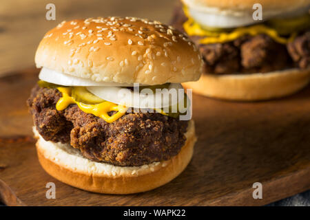 Homemade Mississippi Slug Burgers with PIckle and Onion Rings Stock ...