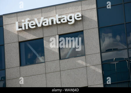 A logo sign outside of the headquarters of LifeVantage in Sandy, Utah ...