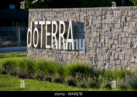 A logo sign outside of the headquarters of doTerra in Pleasant Grove ...