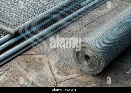 small hole wire mesh for birds cage or animals fence Stock Photo - Alamy