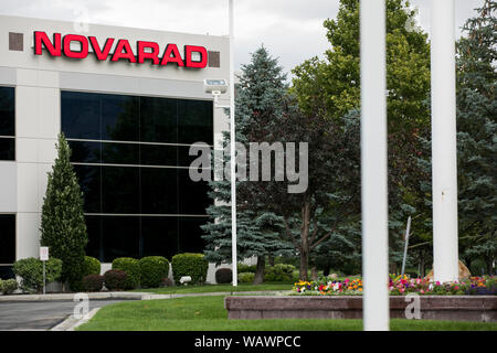 A logo sign outside of the headquarters of Novarad in American Fork ...
