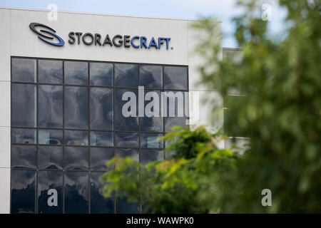 A logo sign outside of the headquarters of StorageCraft in Draper, Utah ...