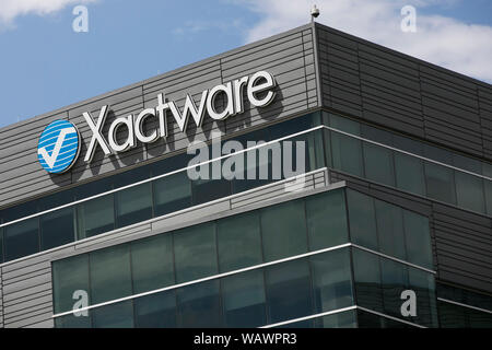 A logo sign outside of the headquarters of Xactware in Lehi, Utah on ...