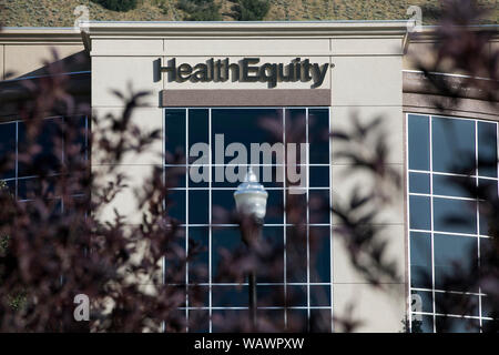 A logo sign outside of the headquarters of HealthEquity, Inc., in ...