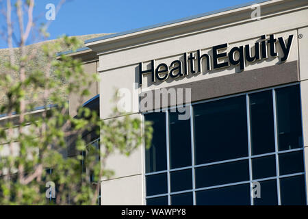 A logo sign outside of the headquarters of HealthEquity, Inc., in ...