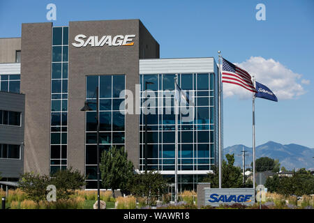 A logo sign outside of the headquarters of Savage Services in Midvale ...