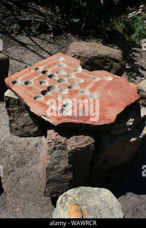 Morabaraba game carved in stone, Basotho Cultural Village, Free State ...