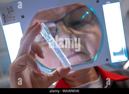 Diabetes under magnifying glass Stock Photo - Alamy