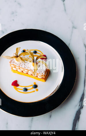 Beautiful dish of mango berries Millefeuilles French puff pastry on ...