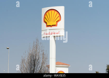 Sign board with Shell Logo in front of a gas station Stock Photo - Alamy