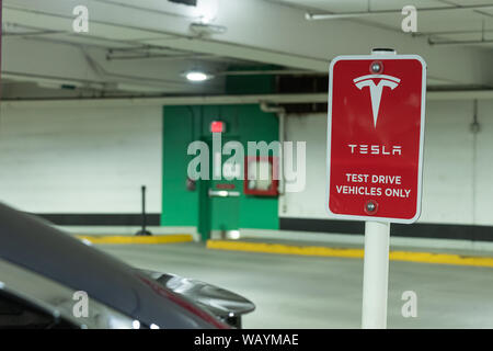 "Tesla Test Test Drive Vehicle Only" sign in a underground parking lot ...