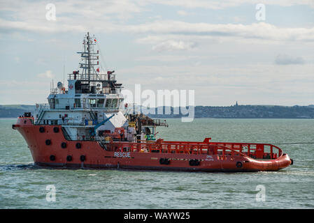 Large Powerful Ocean Going Tug Boat and Floating Crane in Harbour at ...