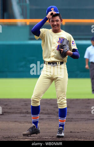 Yasunobu Okugawa of Seiryo High School pitches against Riseisha High ...