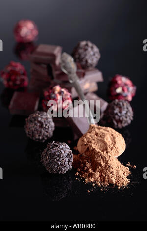 Luxury chocolate candies with cocoa powder Stock Photo - Alamy