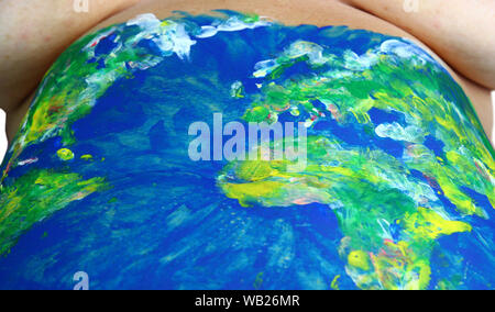 Earth Mother concept, globe body paint on a female pregnant belly Stock ...