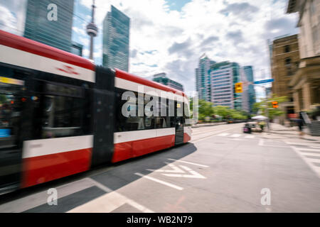 A red tram in downtown Toronto, Canada Stock Photo - Alamy