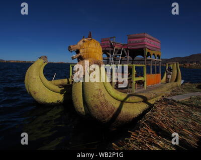 A typical Uro totora balse at Titicaca Lake. The Uru or Uros are an ...