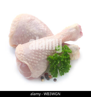 Two raw chicken legs isolated against white Stock Photo - Alamy