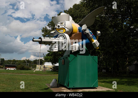 Seabee statue in front of museum Stock Photo - Alamy