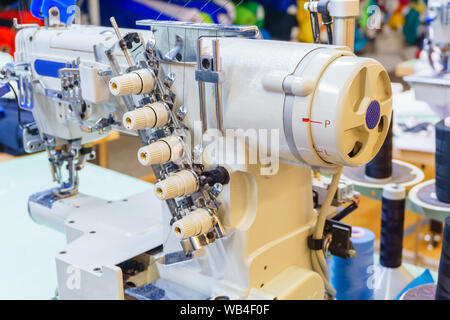 fragment of the interior of a sewing workshop with various equipment ...