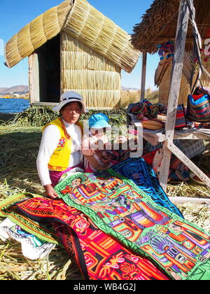 Uru child Uros Islands Lake Titicaca Peru Stock Photo - Alamy