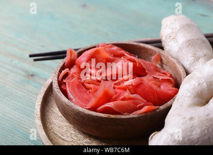 pickled pink ginger and fresh root on the table Stock Photo - Alamy
