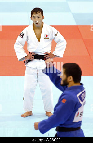 Tokyo, Japan. 25th Aug, 2019. Sumo wrestlers Ichinojo Takashi (L) and ...