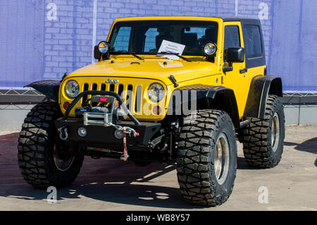 Yellow Jeep Wrangler Rubicon Stock Photo - Alamy