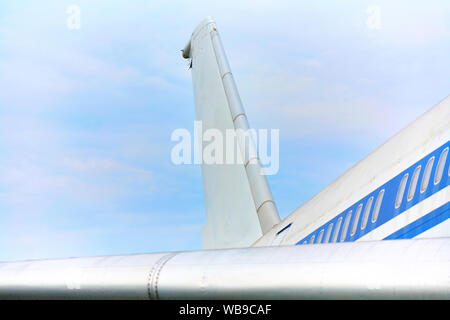 Elements of passenger aircraft with a blue stripe close-up Stock Photo ...