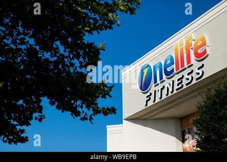 A logo sign outside of a Onelife Fitness location in Hagerstown ...