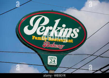 A logo sign outside of a Perkins Restaurant and Bakery location in ...