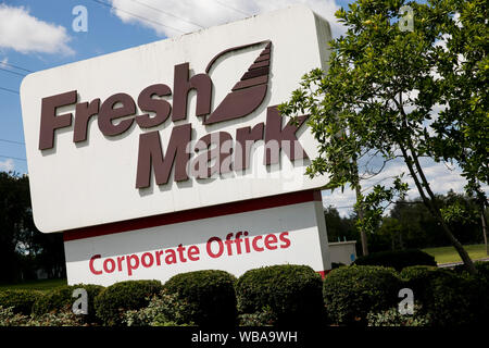A logo sign outside of the headquarters of Fresh Mark, Inc., in ...