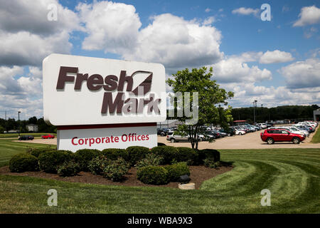 A logo sign outside of the headquarters of Fresh Mark, Inc., in ...