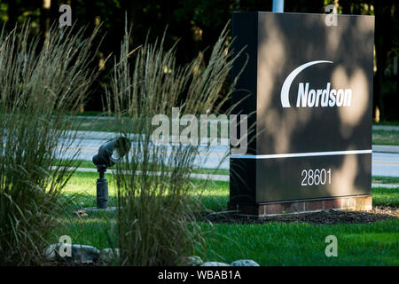 A logo sign outside of the headquarters of the Nordson Corporation in ...