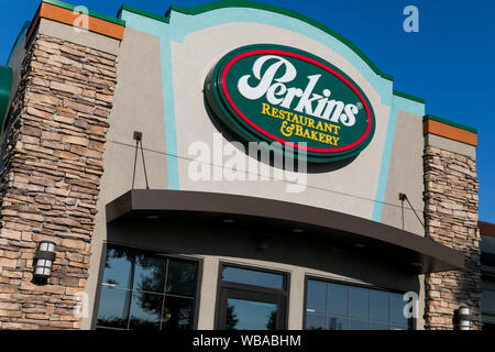 A logo sign outside of a Perkins Restaurant & Bakery location in Avon ...