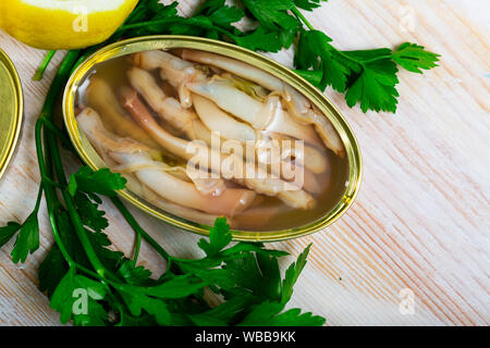 Navajas al natural – traditional spanish canned seafood. Isolated over ...