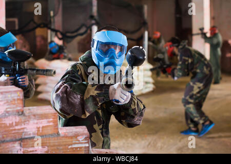 Player in blue mask is targeting in opponent in battlefield in ...