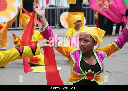 Colorful dancers during the Kadayawan Festival in Davao City ...