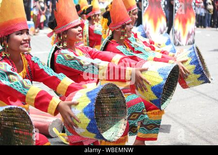Colorful dancers during the Kadayawan Festival in Davao City ...