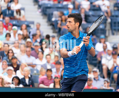 Novak Djokovic (Serbia) retruns ball during round 1 of US Open Tennis ...
