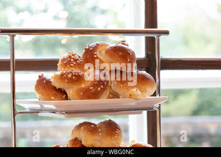 traditional Austrian braided yeast bread with sugar crumbles on a shelf ...