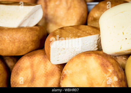 Traditional romanian smoked sheep cheese cascaval Stock Photo - Alamy