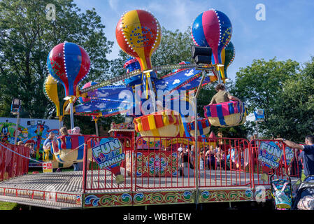 Fairground balloon ride. Merrygoround Stock Photo - Alamy