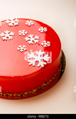 Red mousse cake with white snowflakes Stock Photo - Alamy