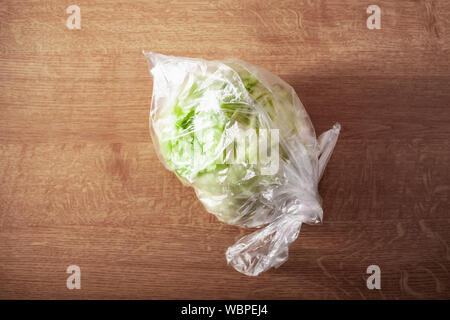 iceberg lettuce in plastic bag package with price tag Stock Photo - Alamy