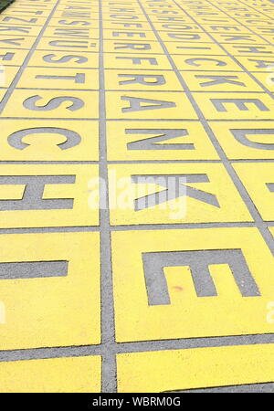 Alphabet lined in yellow background Stock Photo - Alamy